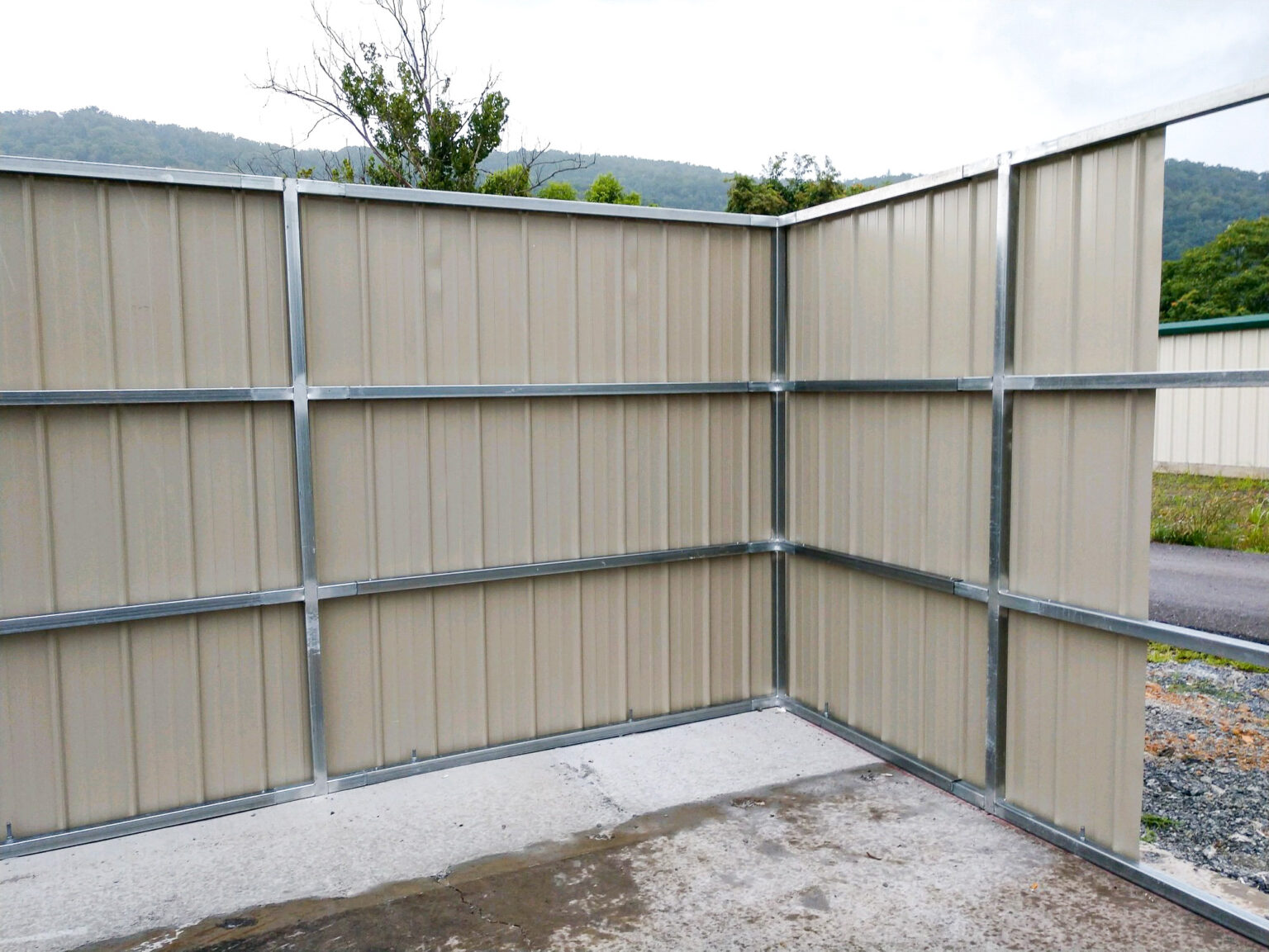 Streamline Construction with CMU Dumpster Enclosures!